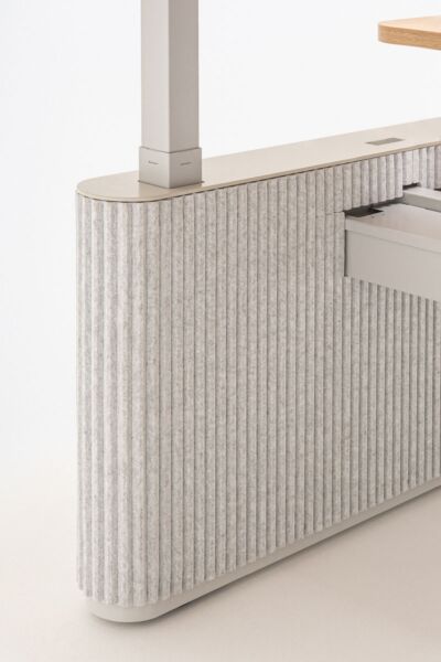 Ogi Drive electrically adjustable bench desk with felt panels