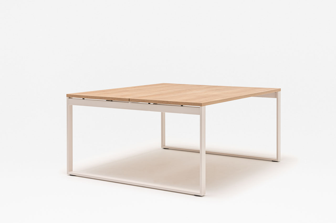 Ogi Drive electrically adjustable bench desk with felt panels